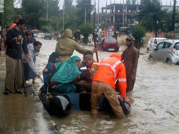 Floods cripple Jammu and Kashmir, weather office says worst over ...