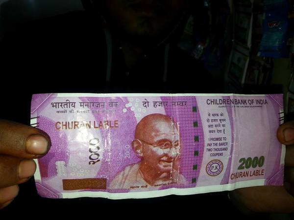 Bizzare! ATM dispenses Rs 2,000 notes with 'CHURAN LABEL' in place of ...