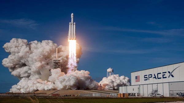 Falcon Heavy rocket soars towards sky with 24 research satellites ...