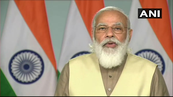 PM Modi unveils coin, postal stamp to mark 100 years of Lucknow varsity ...