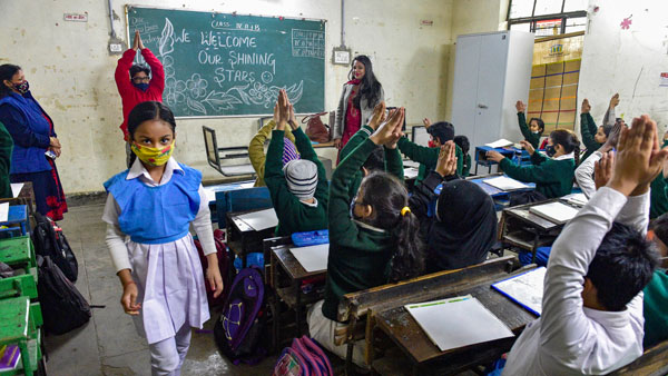 Full day classes for 1 to 9 and 11 students till April 30 - Oneindia News