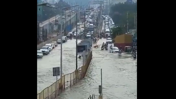 Bengaluru turns 'Venice' after downpour; Bellandur Lake overflows ...