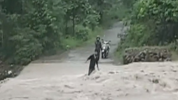 Caught on cam: Man swept away in river in Uttarakhand - Oneindia News