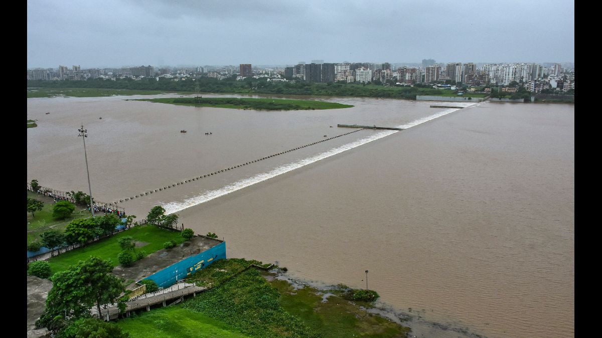 Surat Deputy Mayor Criticised for Piggyback Ride in Flood Area ...