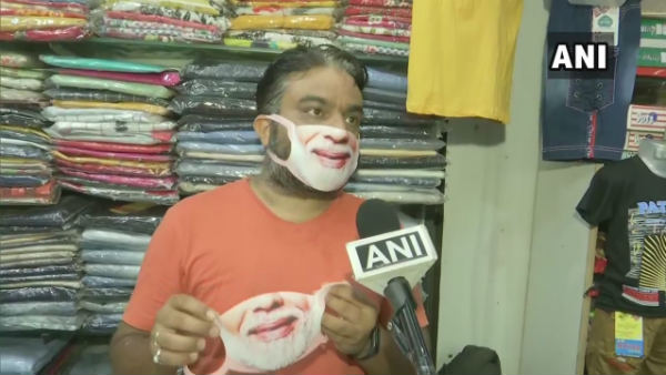 PM Modi's face printed masks: ಜನರನ್ನು ಆಕರ್ಷಿಸುತ್ತಿದೆ ಮೋದಿ ಮಾಸ್ಕ್ ...