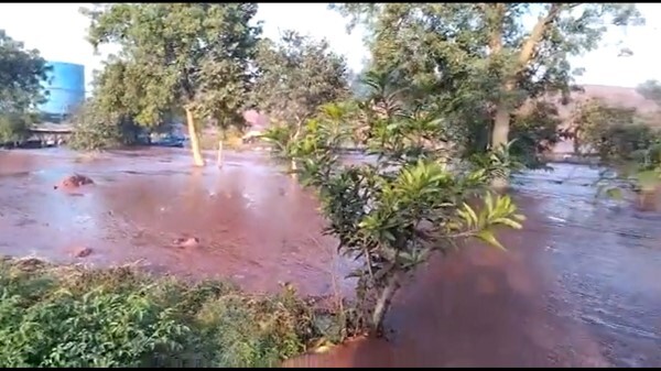 Farmland near a steel plant was submerged in iron ore slurry In Odisha ...