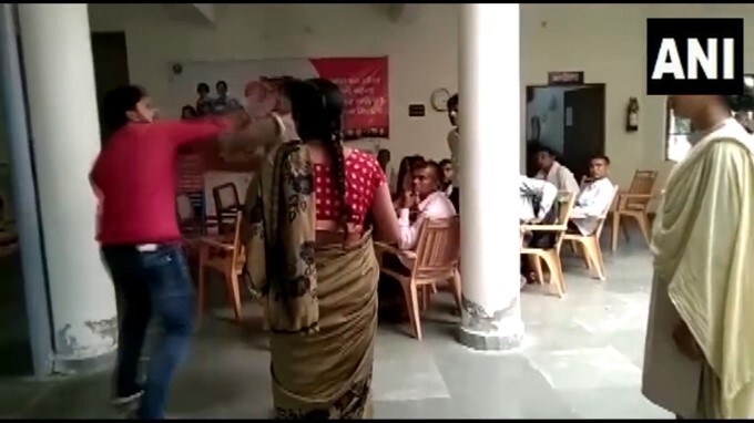 Young man beats police official inside a police station in Mianpuri UP ...