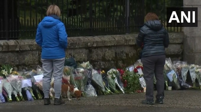 People Place Floral bouquets outside the premises of Balmoral castle ...
