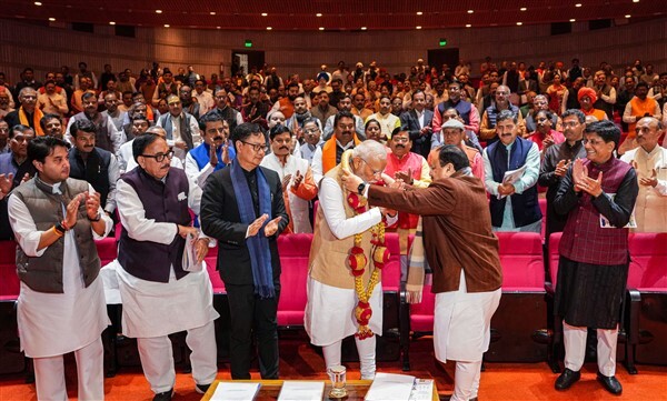 Prime Minister Narendra Modi being felicitated by BJP National ...