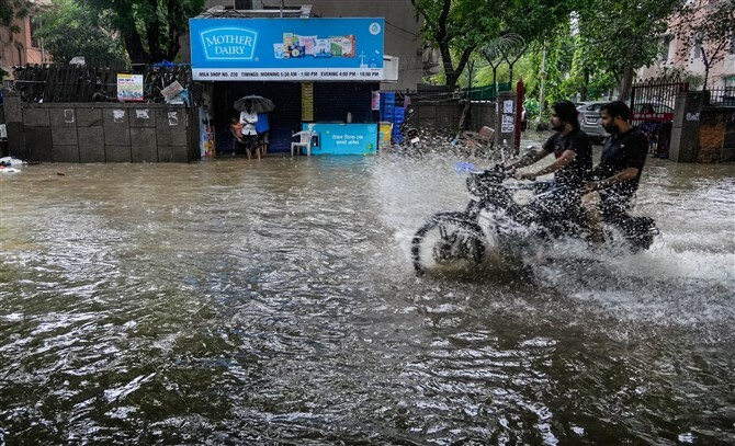 Monsoon Deluge in New Delhi: City Drenched in Heavy Rainfall; See ...