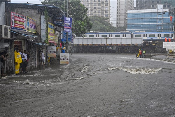 Title: Mumbai Rains: IMD's Red Alert Extended, Mumbai city battles ...