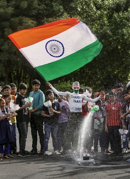 Students Celebrate The Successful Soft Landing Of ISRO's Chandrayaan-3 On The Surface Of The ...