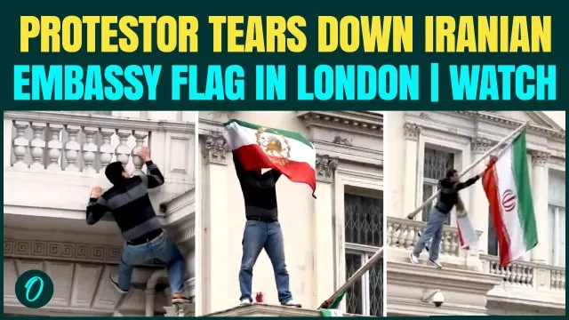 Iran Protest Breaking: UK Protester Tears Down Iranian Flag Outside ...